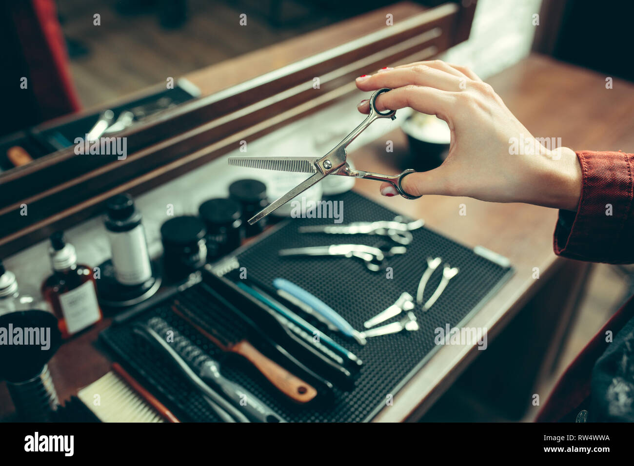 Barbershop. Female barber at salon. Gender equality. Woman in the male ...