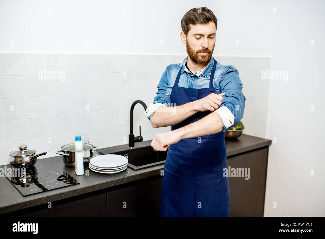 Husband doing housework hi-res stock photography and images - Alamy