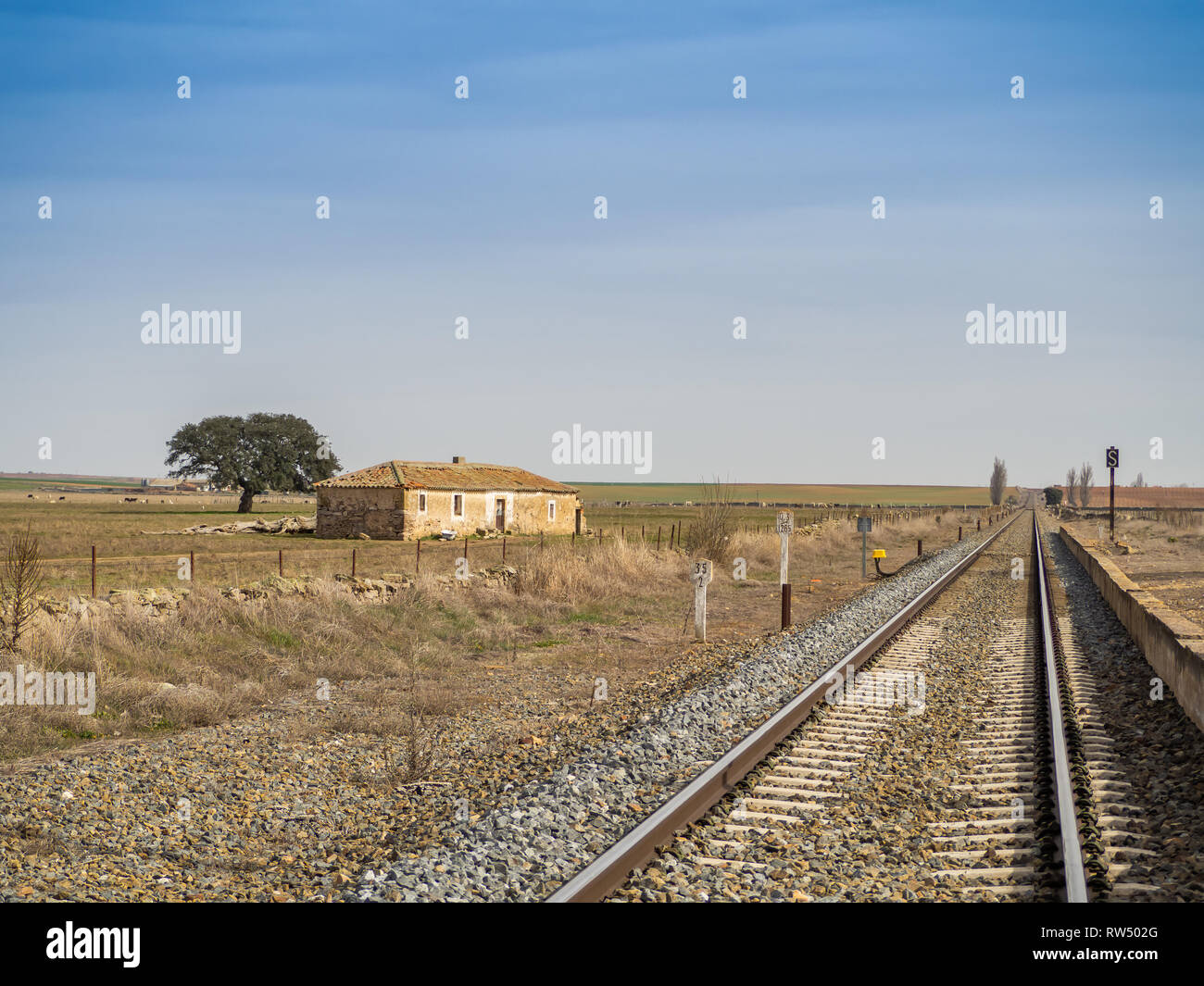 Rural landscape of a railway track and a small railway station Stock ...