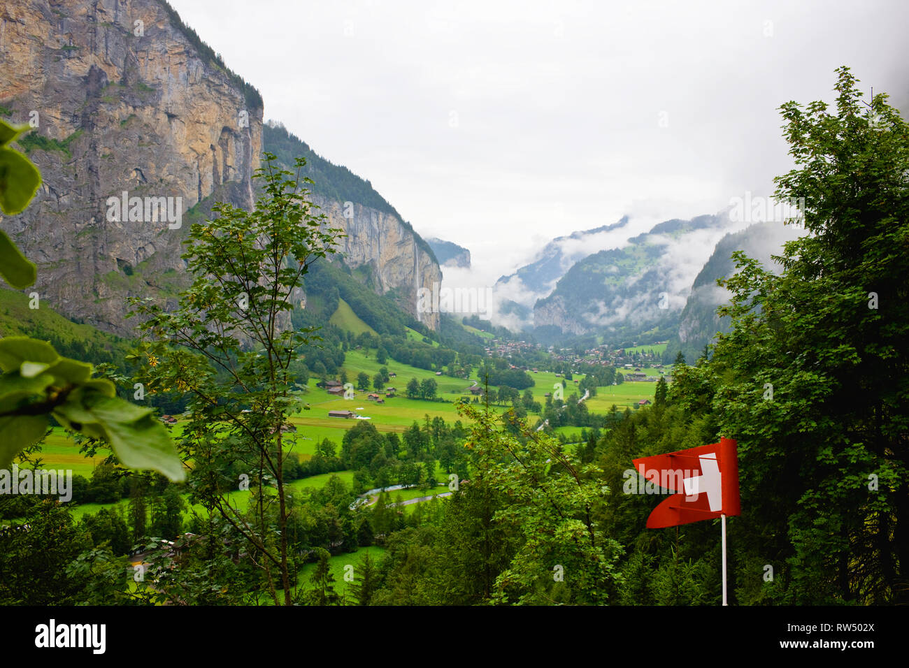 Landscape with Swiss flag Stock Photo - Alamy