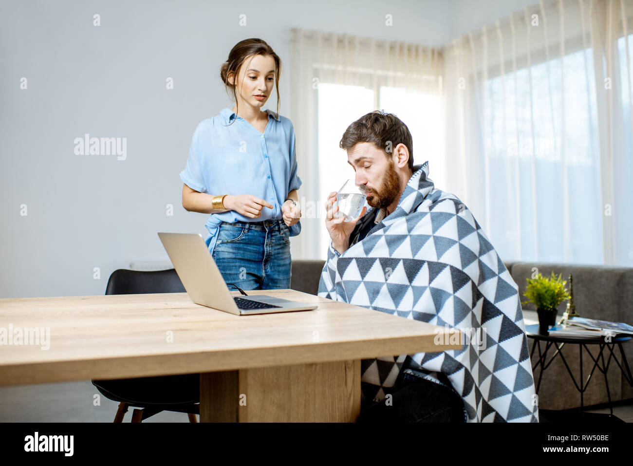 Sick man fever taking temperature hi-res stock photography and images ...