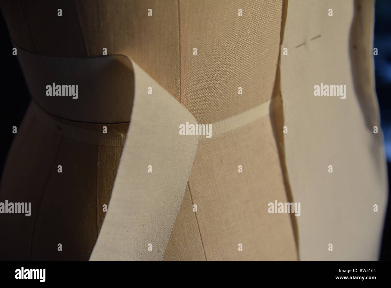 Pattern Making (fashion) — a calico toile on a dressmaker's dummy Stock ...