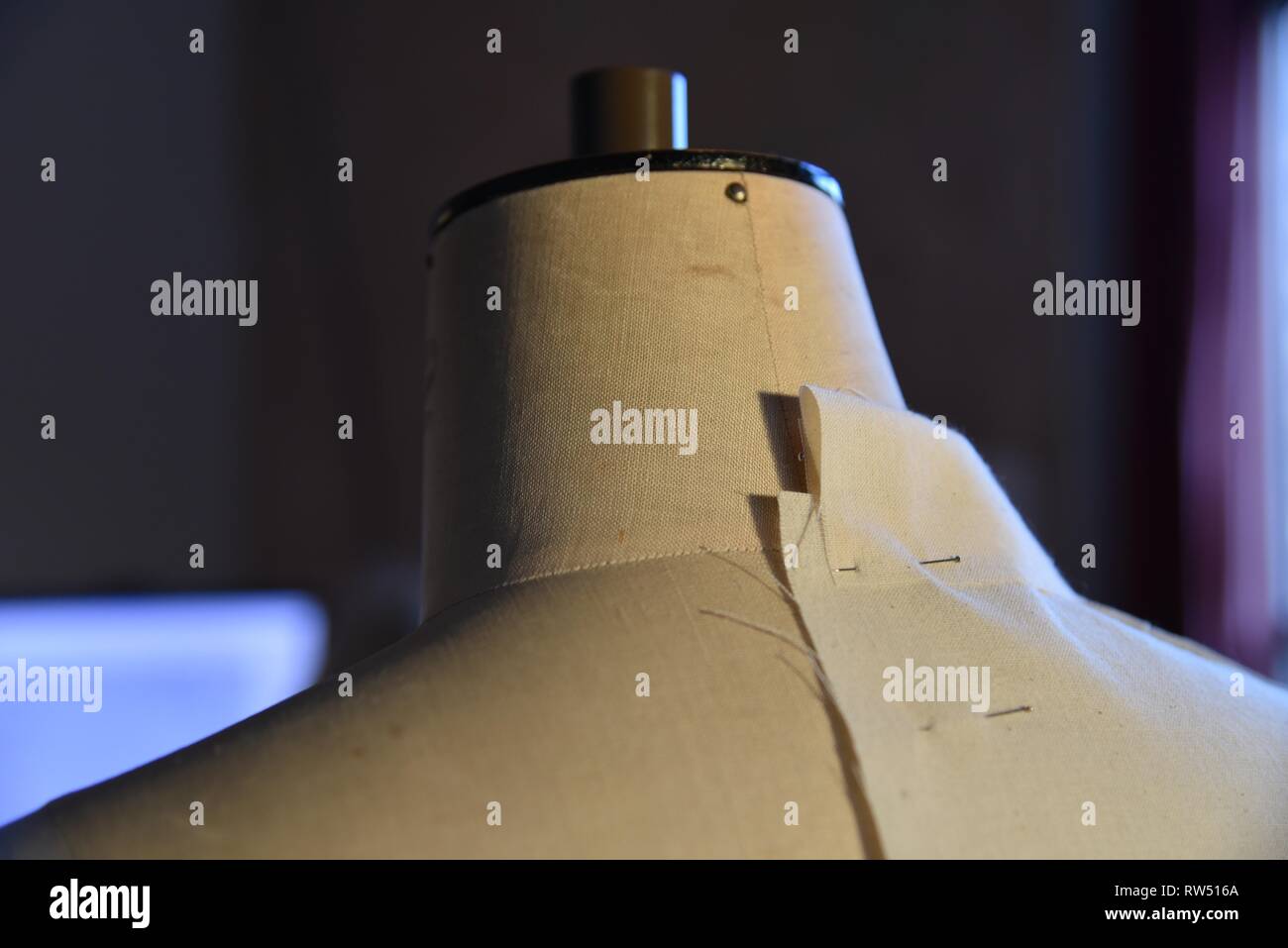 Pattern Making (fashion) — a calico toile on a dressmaker's dummy Stock ...