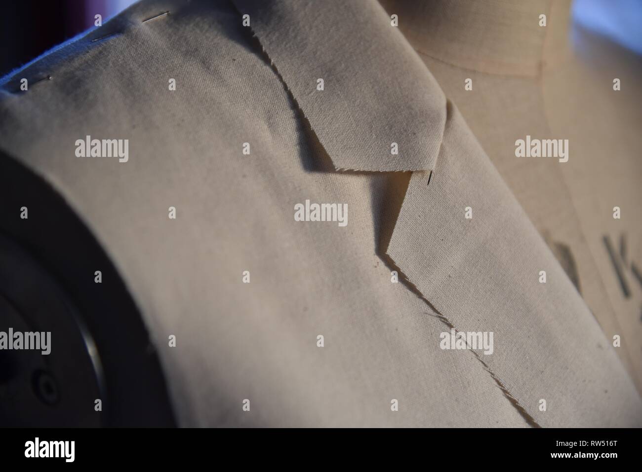 Pattern Making (fashion) — a calico toile on a dressmaker's dummy Stock ...