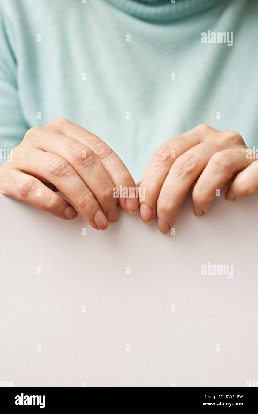 sequence images of the hands of a woman ripping a paper in half Stock ...