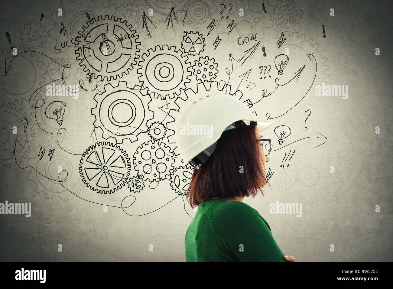 Hard thinking pensive woman engineer looking thoughtful wearing ...