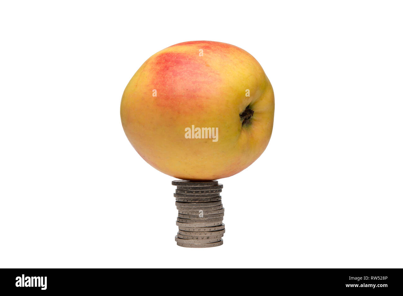 Rows of coins isolated on white background next to multicolored thread ...