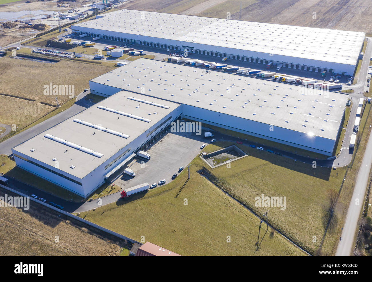 Aerial view from drone of warehouse storage or industrial factory or ...