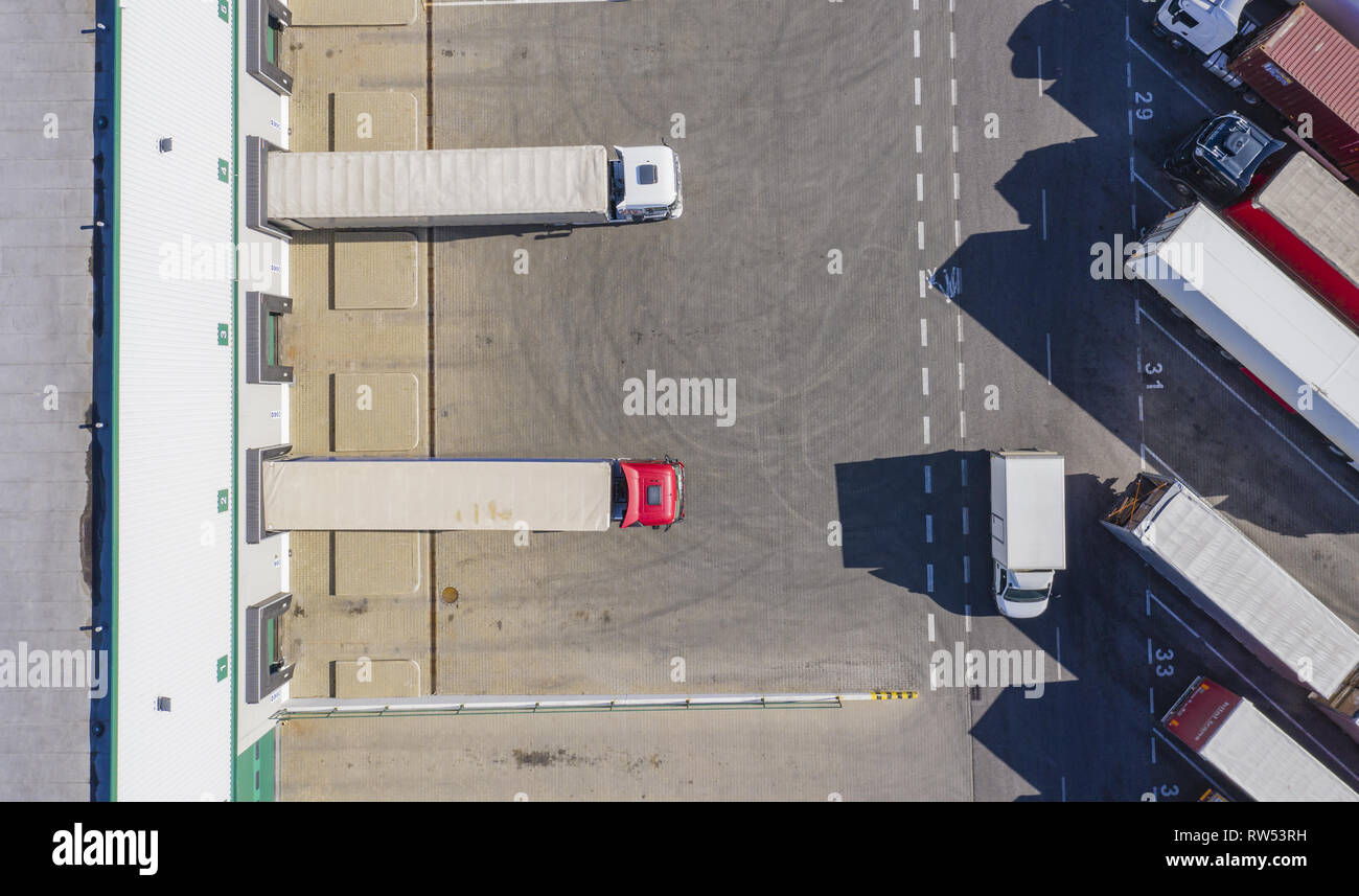 Trailers at docking stations of a distribution center waiting to be ...
