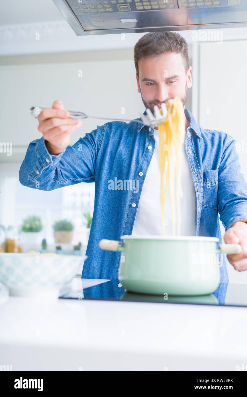 Hispanic boy eating pasta hi-res stock photography and images - Alamy