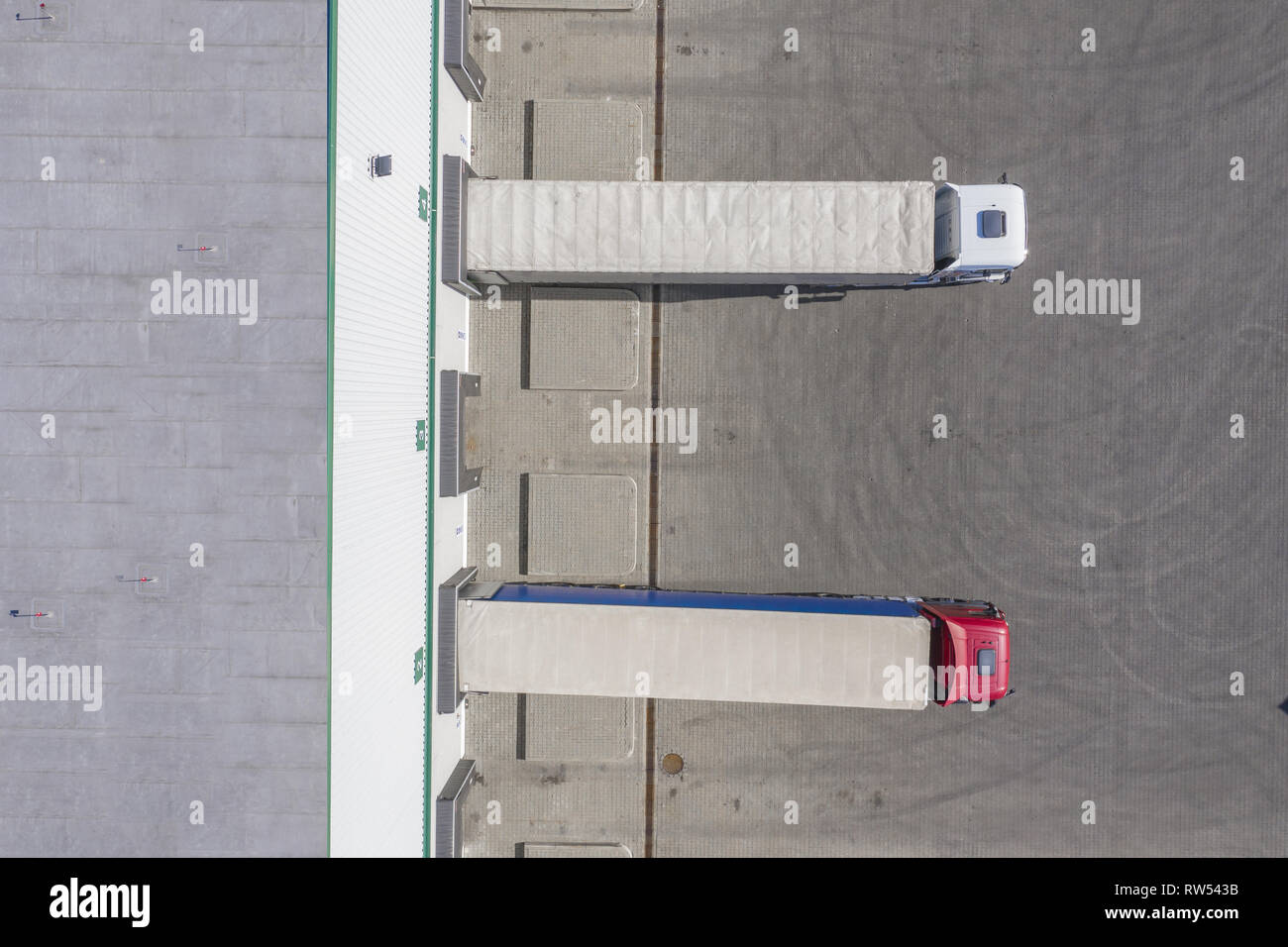 Trailers at docking stations of a distribution center waiting to be ...