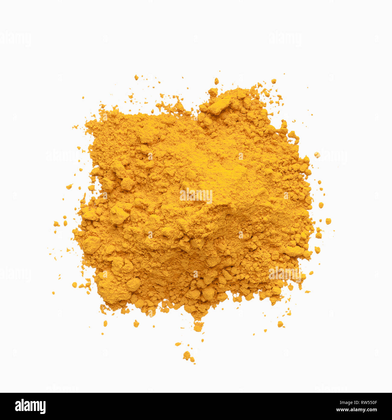 Heap of turmeric powder isolated on white background Stock Photo - Alamy