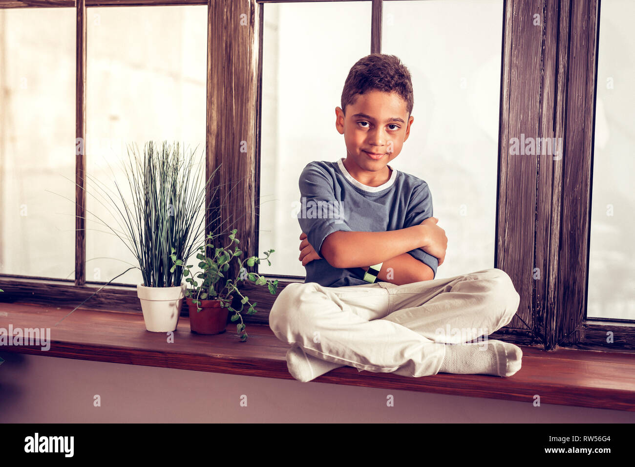 Handsome international boy looking straight at camera Stock Photo - Alamy