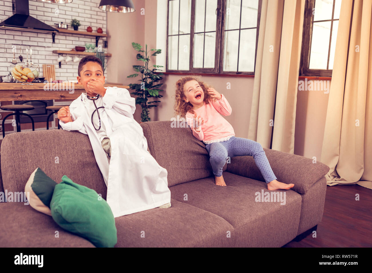 Happy children enjoying their weekends at home Stock Photo - Alamy