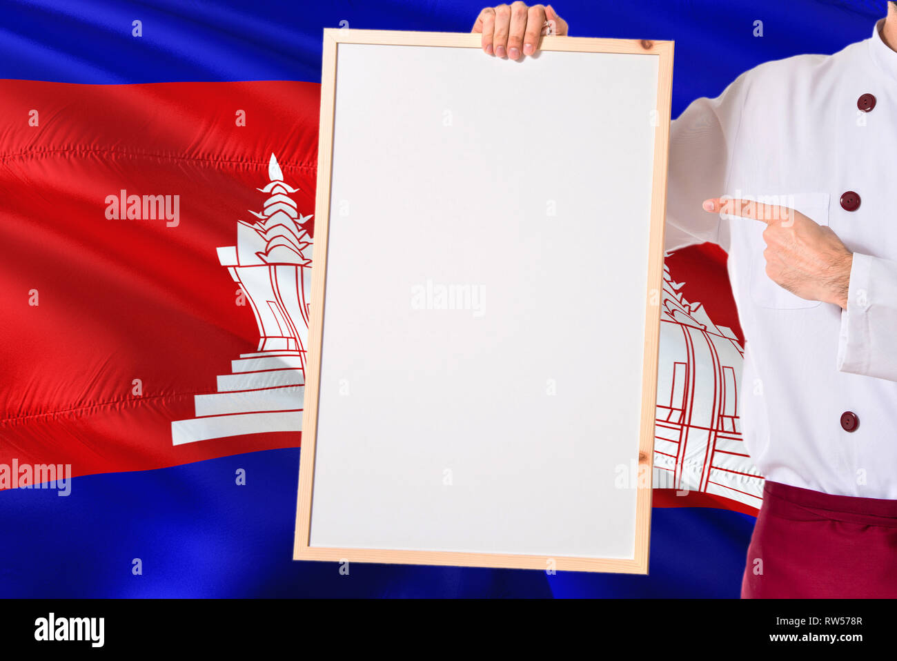 Cambodian Chef holding blank whiteboard menu on Cambodia flag ...