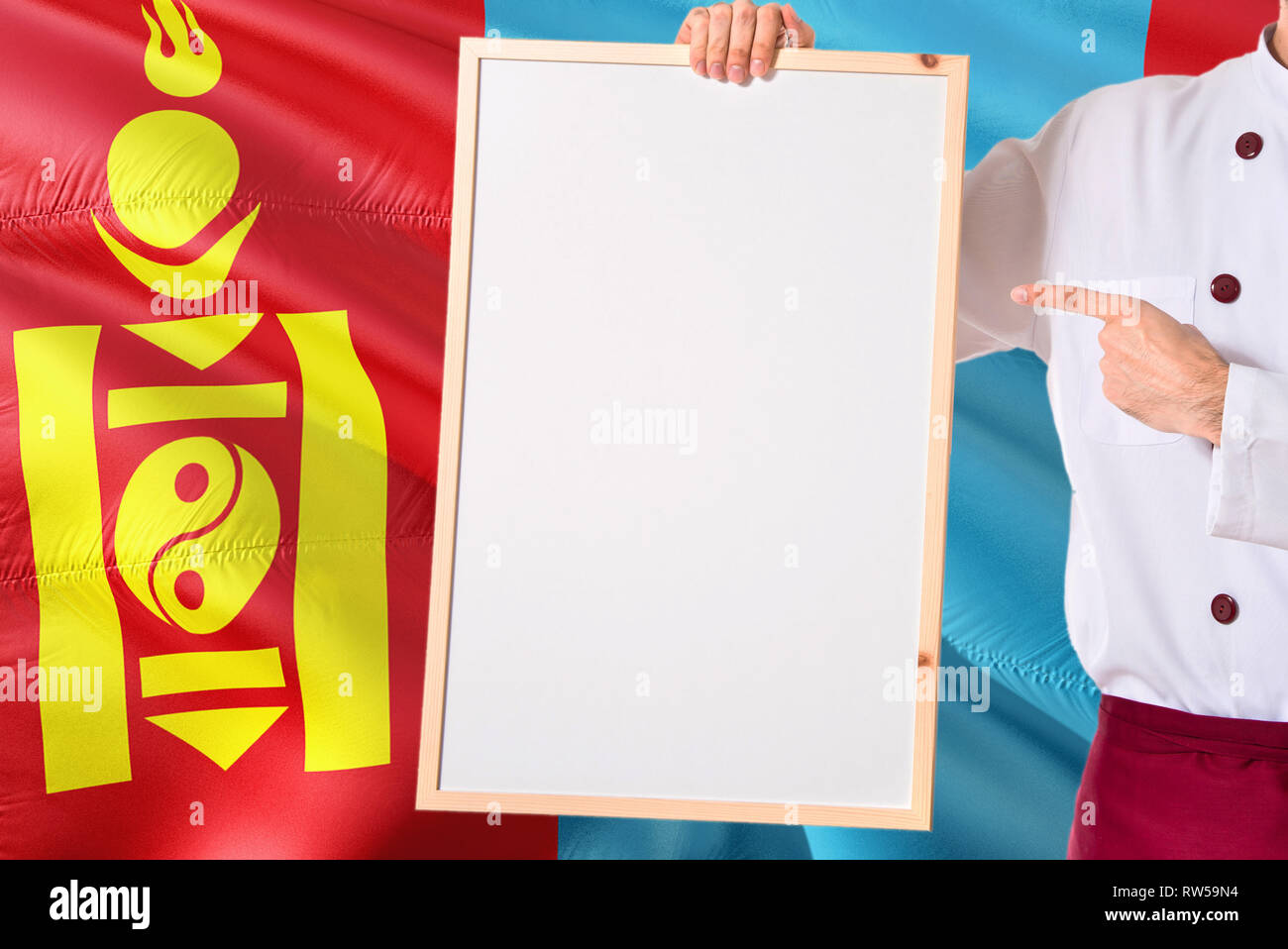 Mongolian Chef holding blank whiteboard menu on Mongolia flag ...