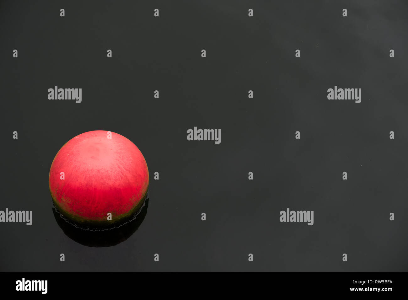 Floating red ball hi-res stock photography and images - Alamy