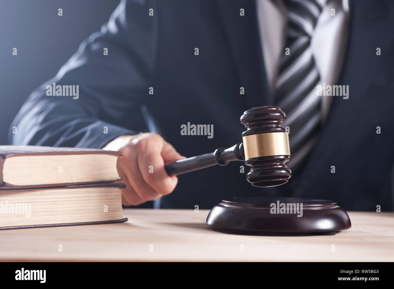 Judge holding hi-res stock photography and images - Alamy