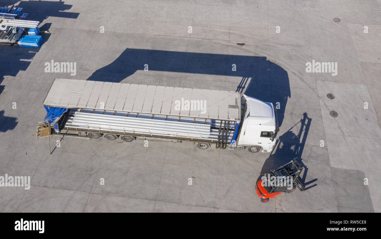 Loading Boxes at Pallet With Forklift in Cargo Container, warehouse ...