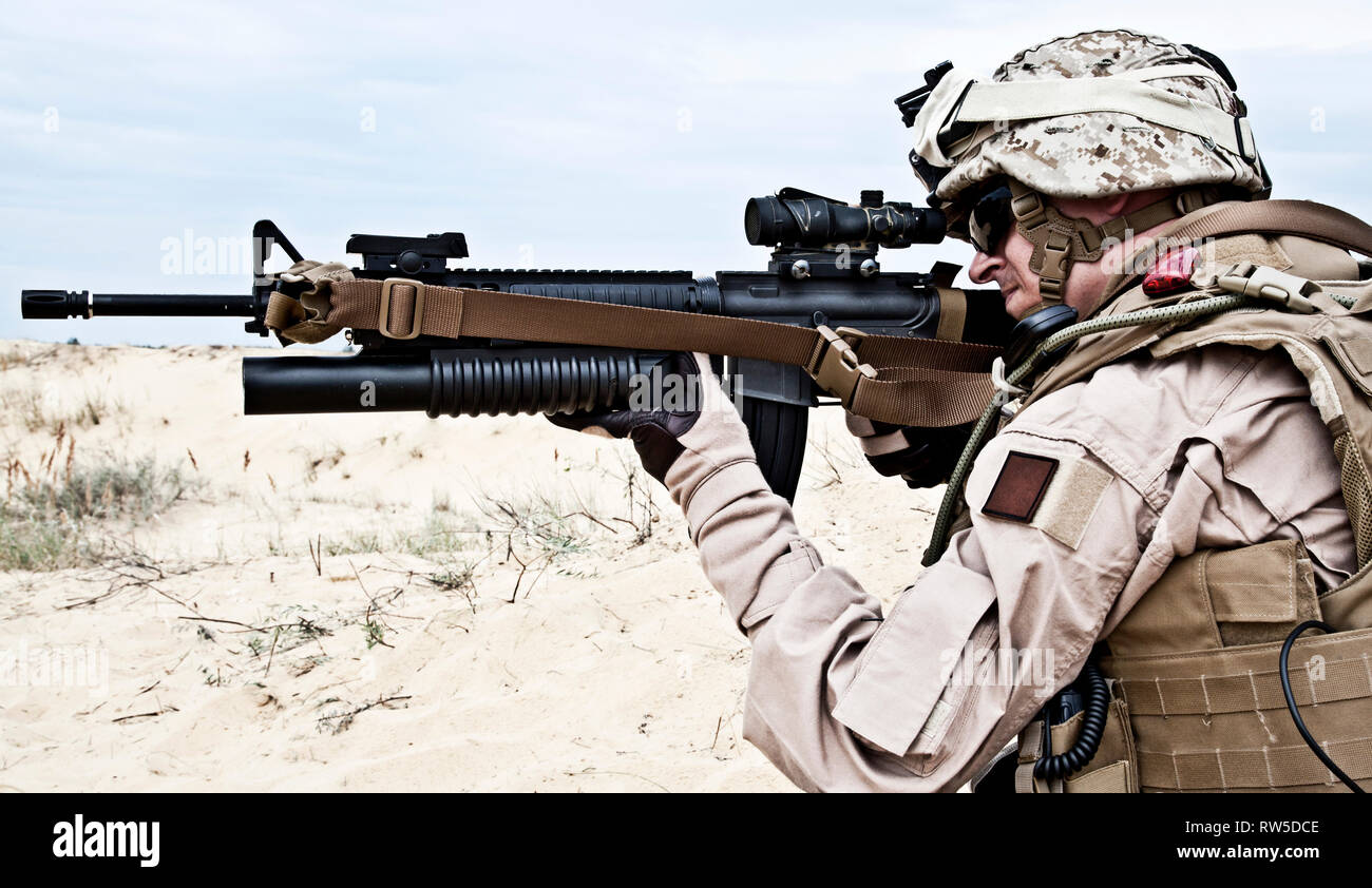 U.S. Marine in the desert through the military operation Stock Photo ...
