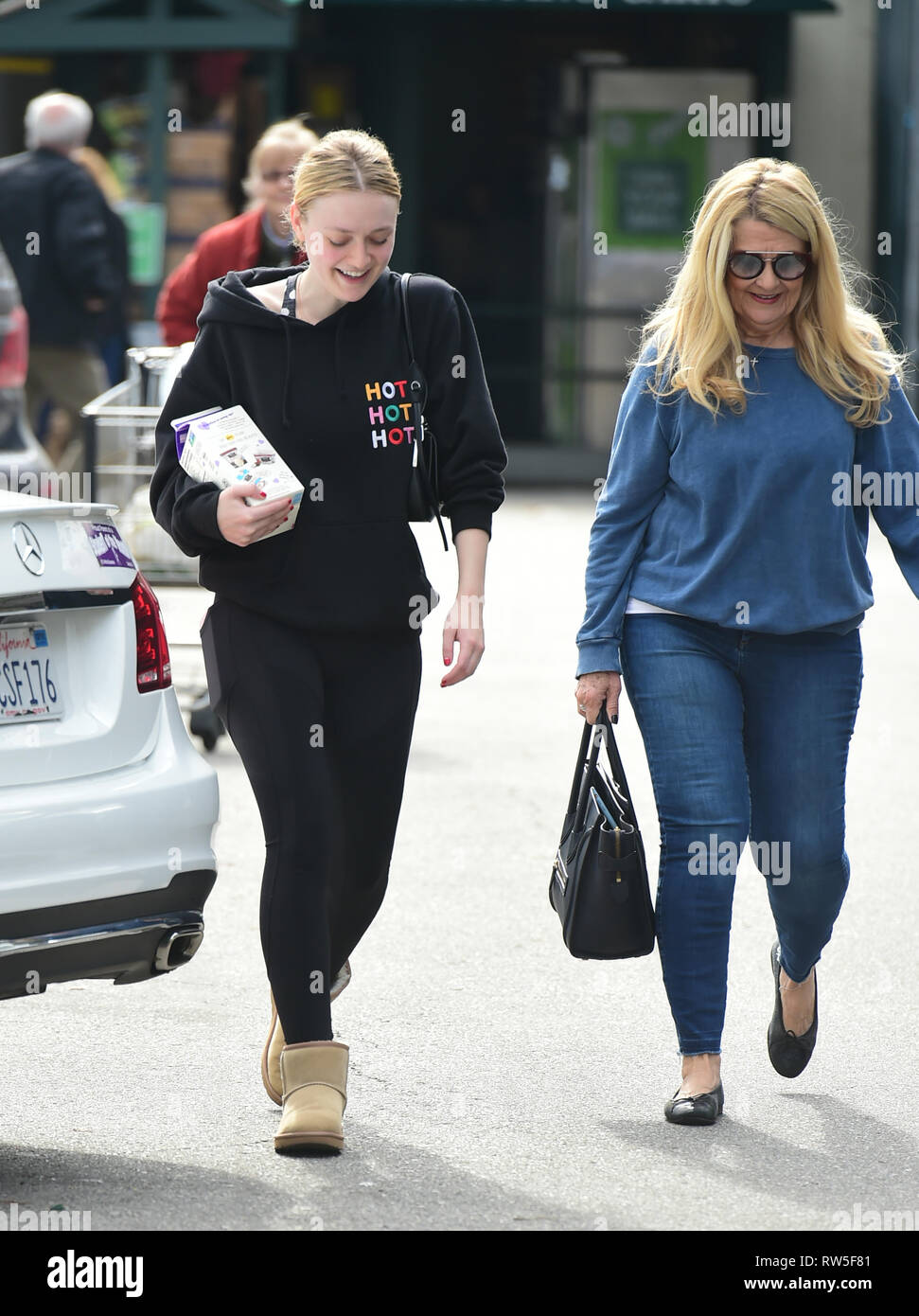Dakota Fanning stops by Whole Foods Market with her grandmother after a ...