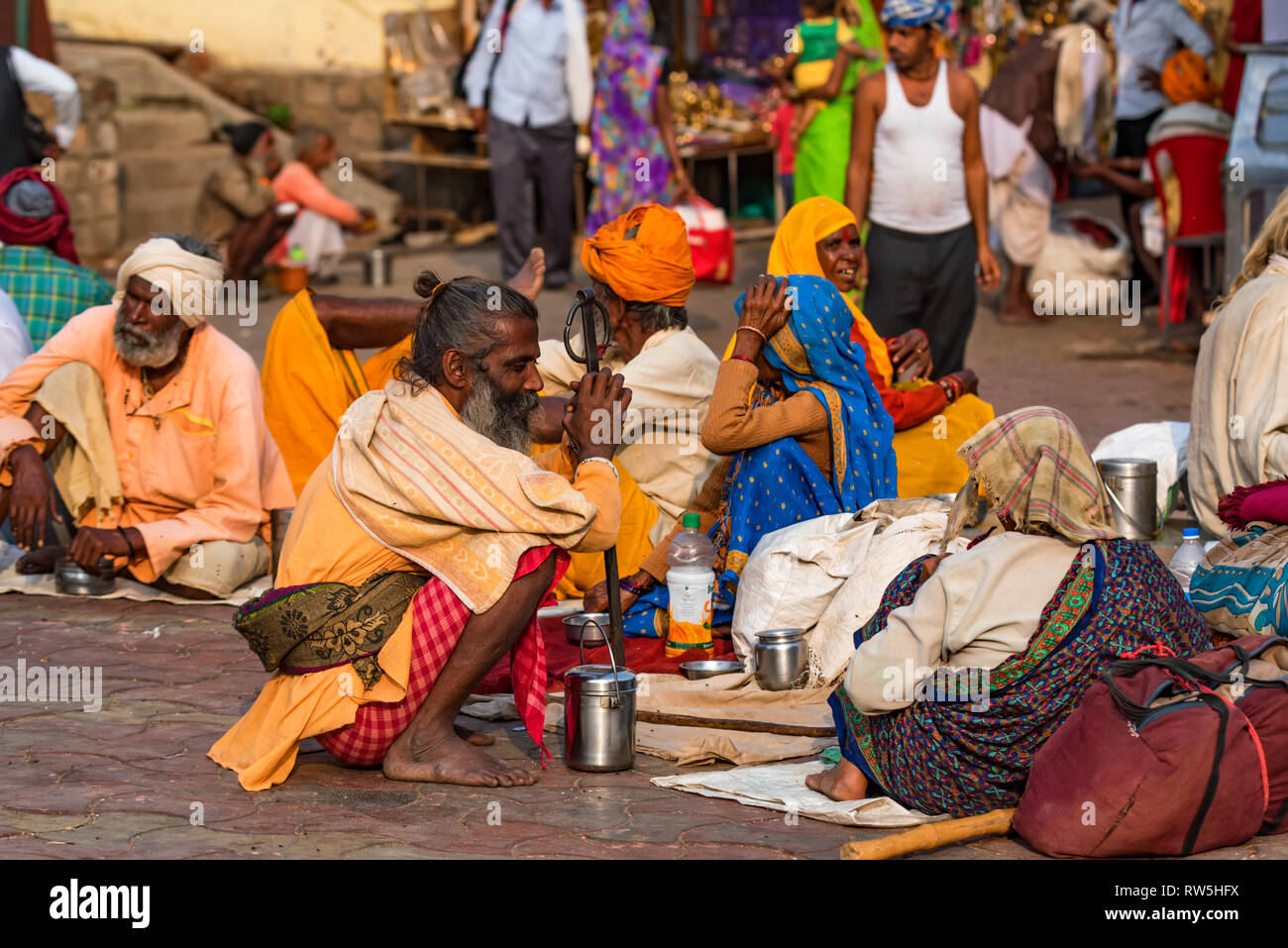 Indian man sitting ground hi-res stock photography and images - Alamy