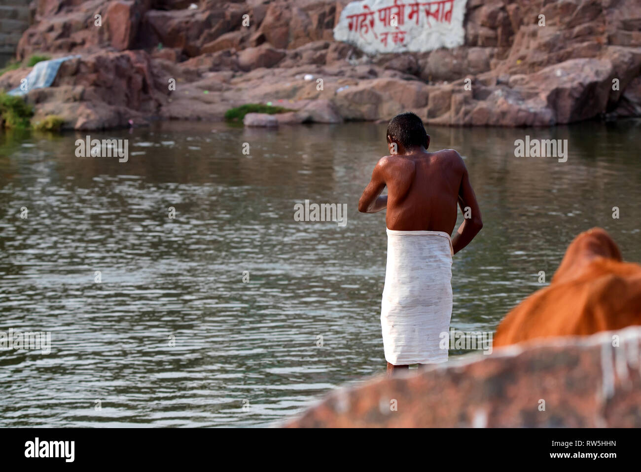 Unidentified indian man cleaning hi-res stock photography and images ...
