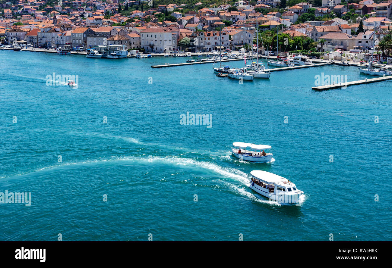 View of the port and embankment from the fortress of the city of Trogir ...