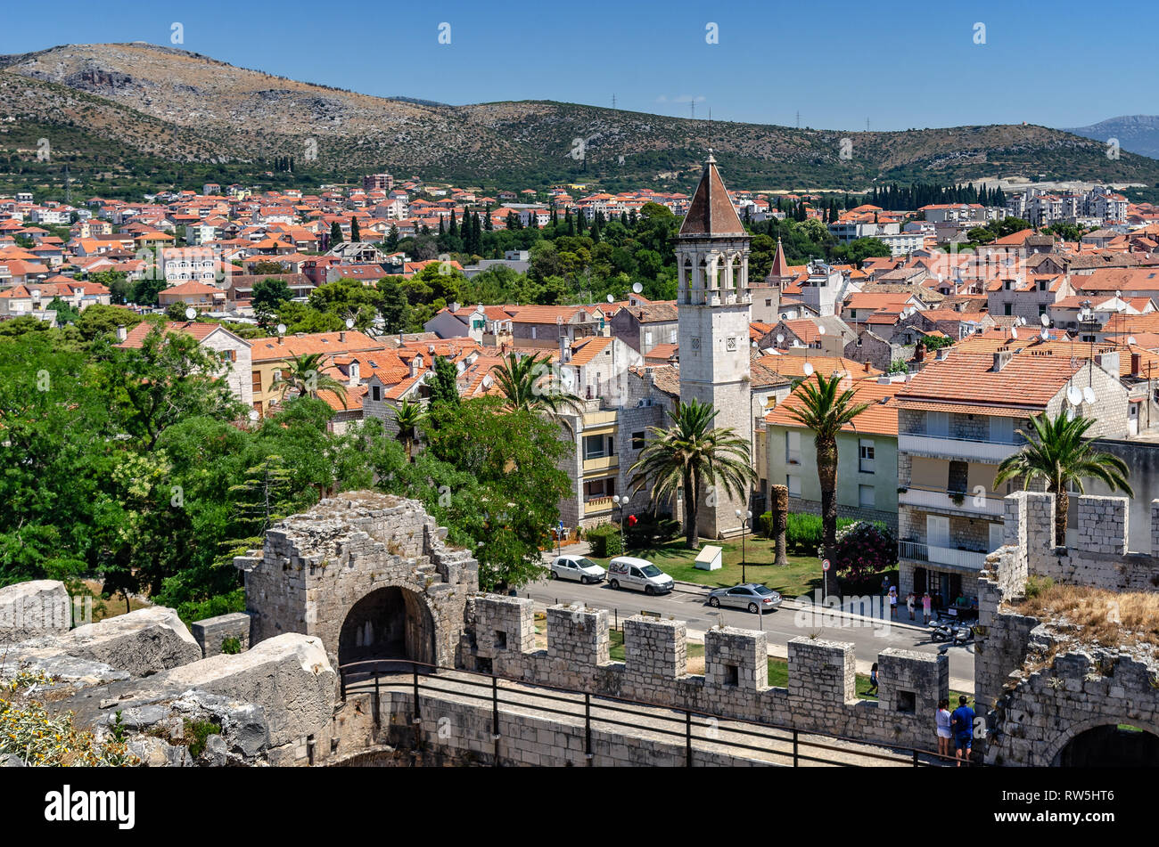 View of the port and embankment from the fortress of the city of Trogir ...