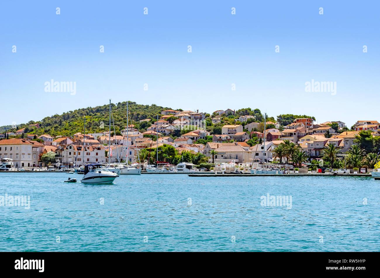 View of the port and embankment from the fortress of the city of Trogir ...