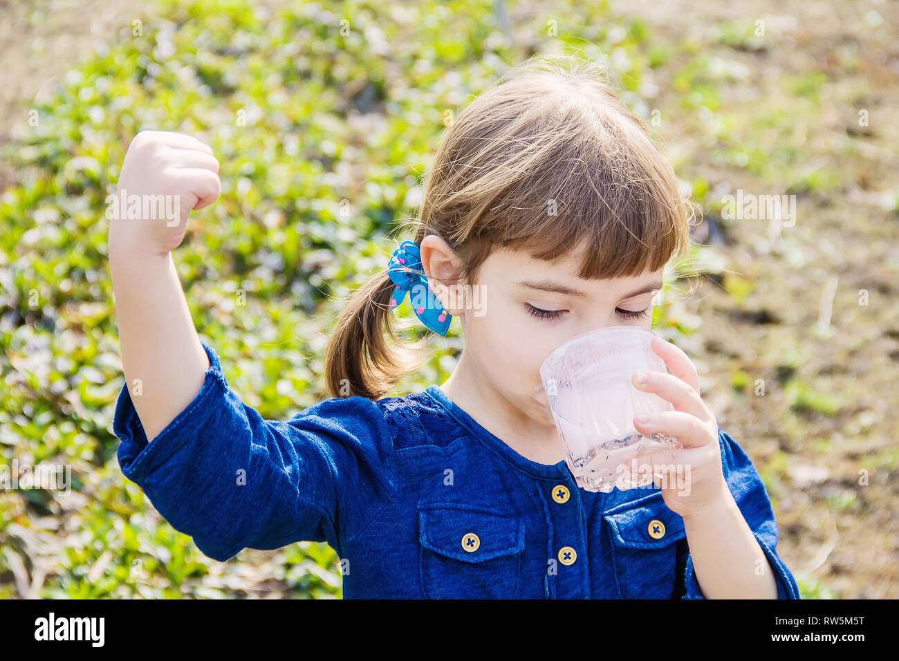 The child drinks milk. Selective focus. Kids Stock Photo - Alamy