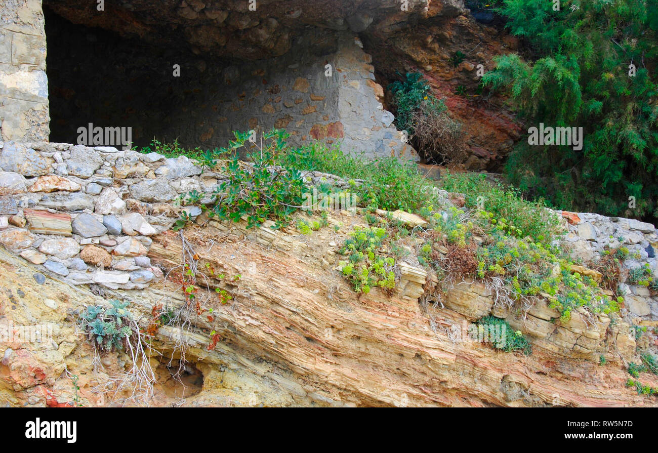 different layers of soil and a wall of bricks in Sisi, Crete, Greece ...