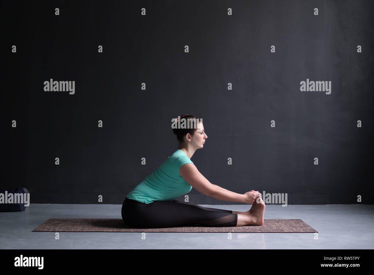 Paschimottanasana pose exercise hi-res stock photography and images - Alamy