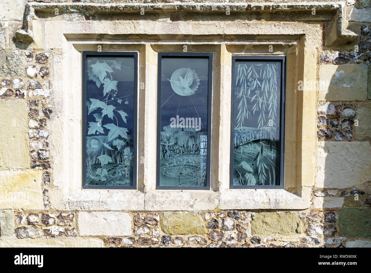 Decorative engraved glass church window Stock Photo - Alamy