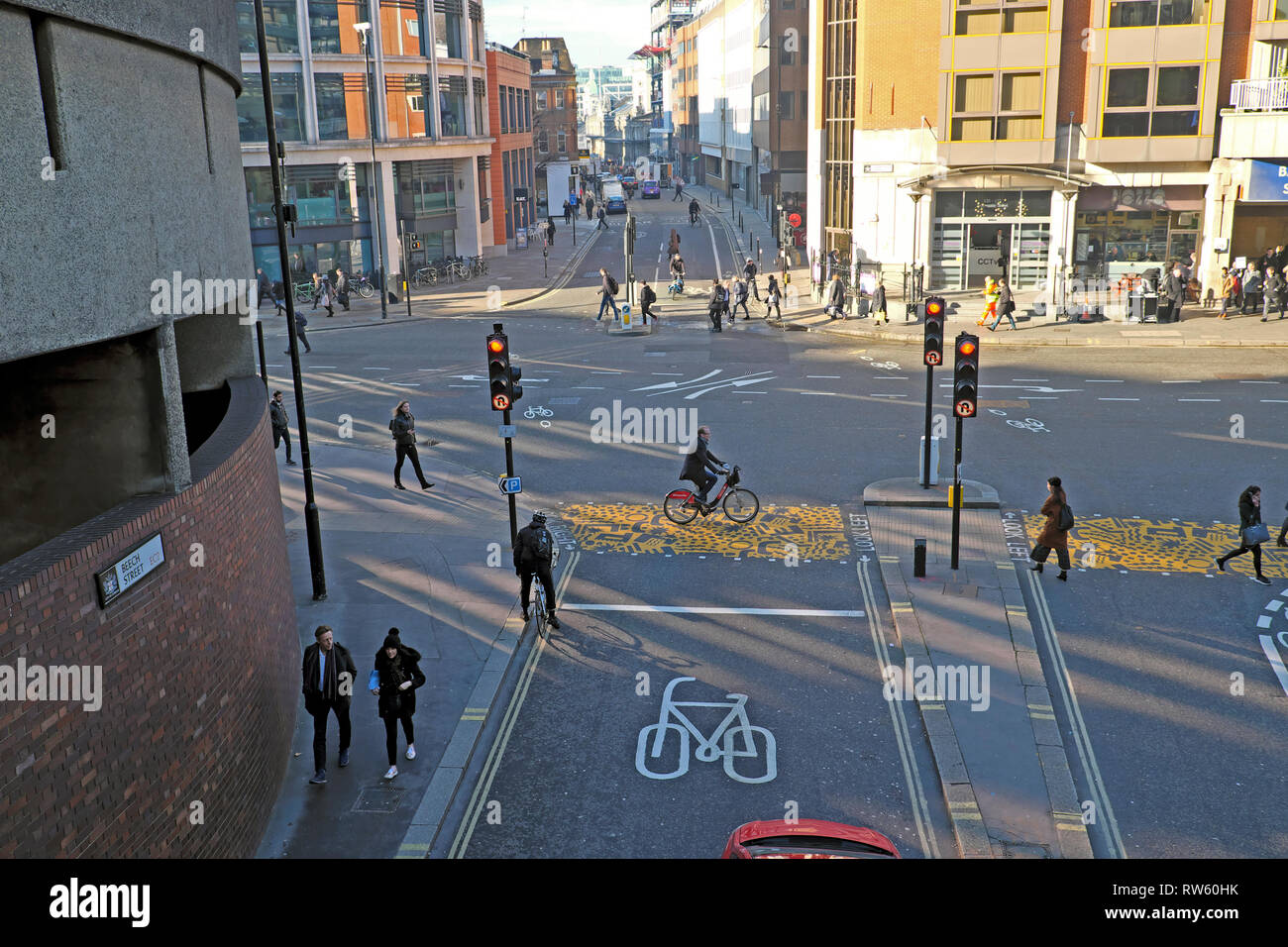 Bicycle lane, cyclist on a bike on a pedestrian crossing and ...