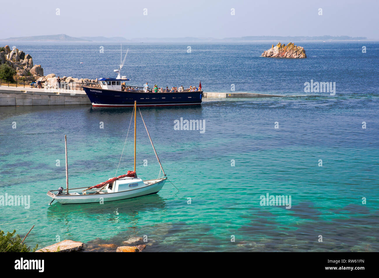 The St. Mary's ferry alongside the quay at St. Agnes, Isles of Scilly ...