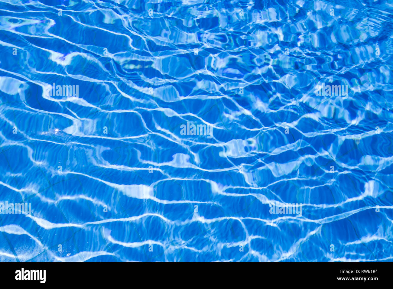 Blue water in a swimming pool Stock Photo - Alamy