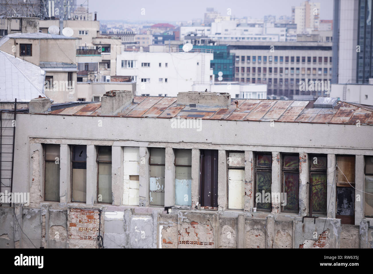 Inhabited, old and decayed (almost ruined) building in the old part of ...