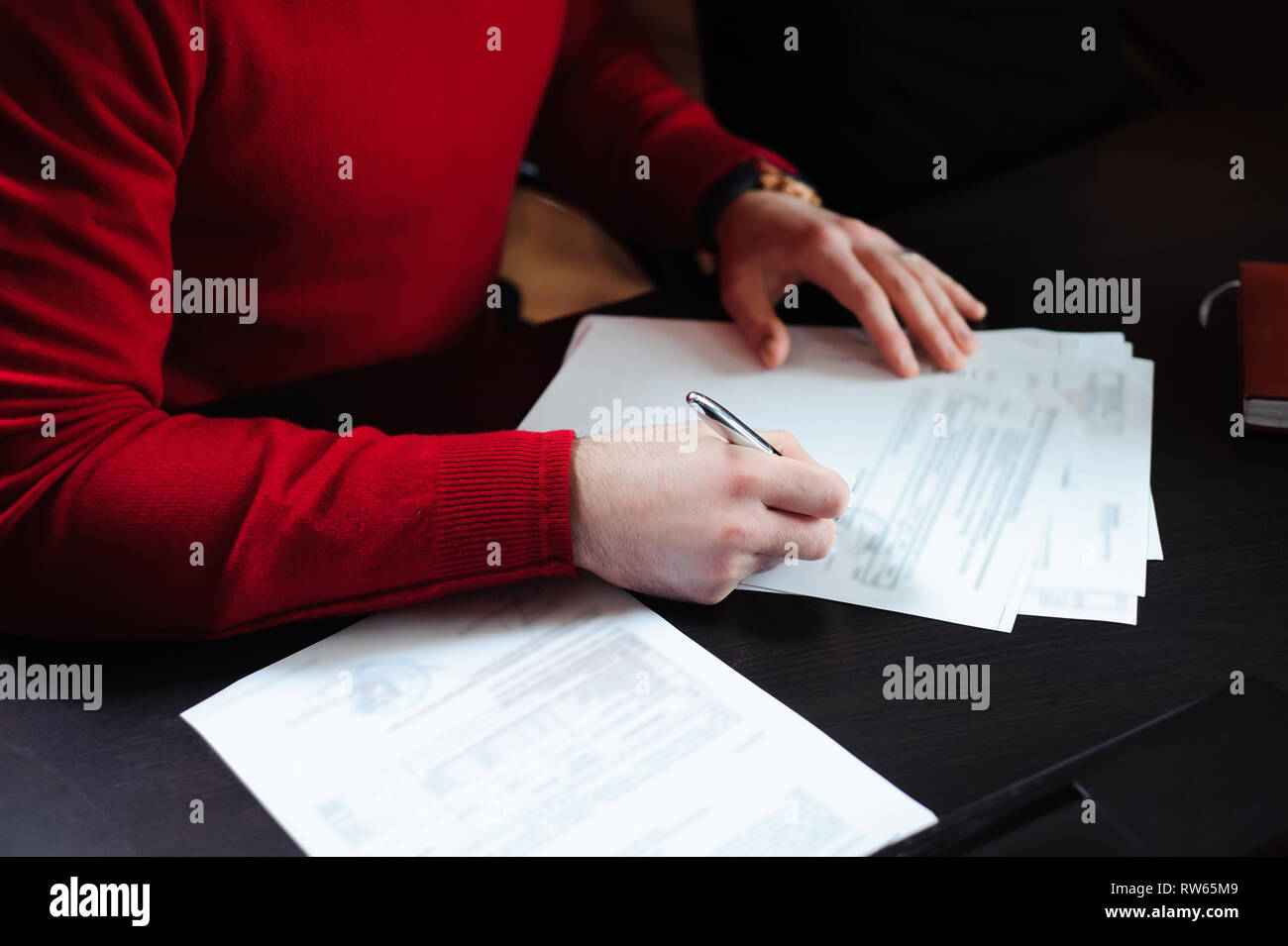 Man hands over documents hi-res stock photography and images - Alamy