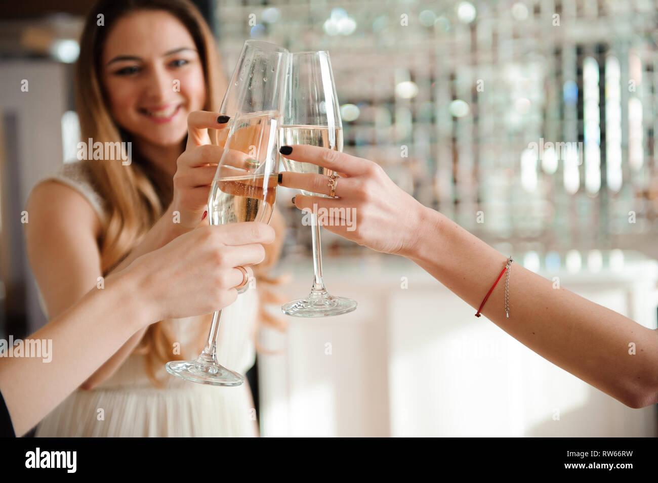 Group people with champagne dancing at the party Stock Photo - Alamy