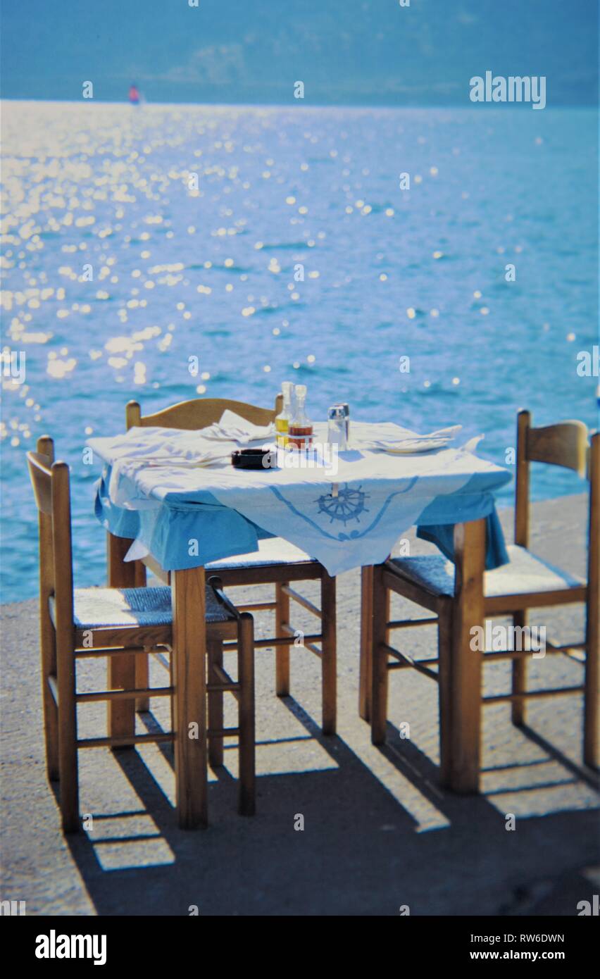 greece table restaurant on the port of lefkada island Stock Photo - Alamy