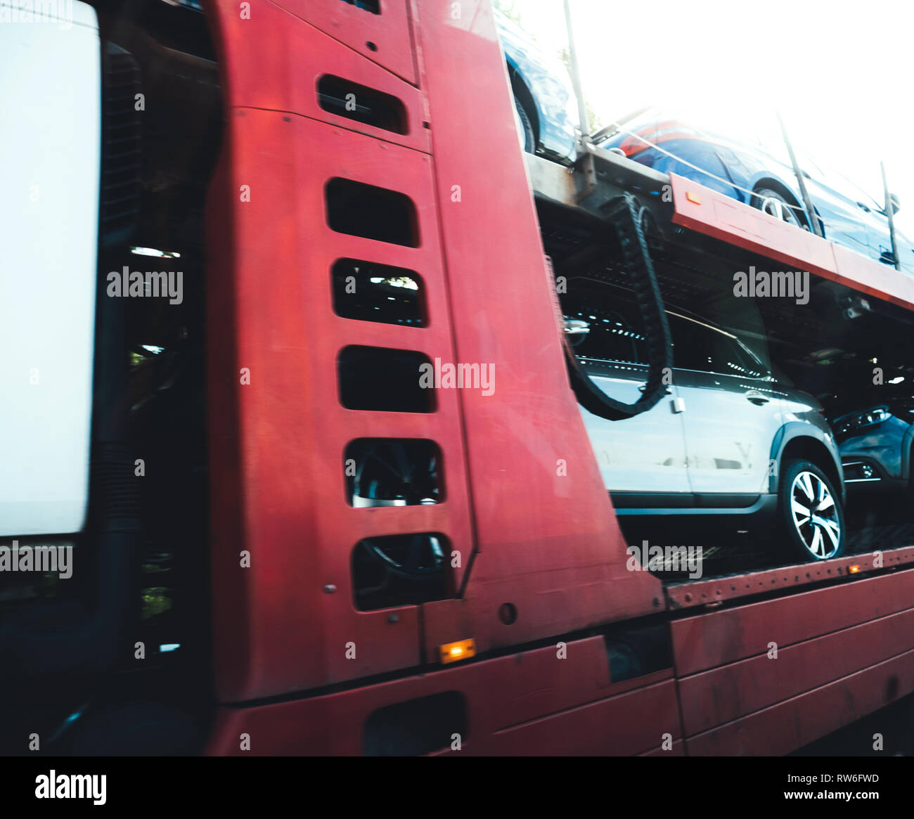 Side view of car truck transporting multiple cars Stock Photo - Alamy