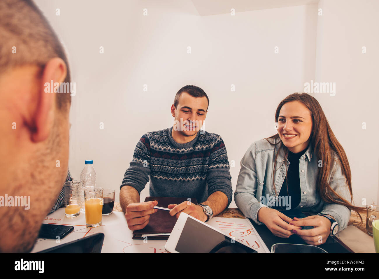 Group of successful people are having a briefing in the office Stock ...