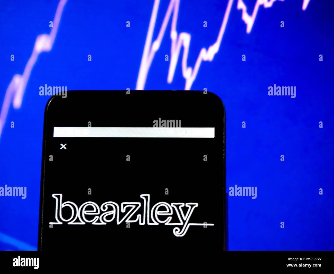 Beazley Group logo seen displayed on smart phone Stock Photo - Alamy