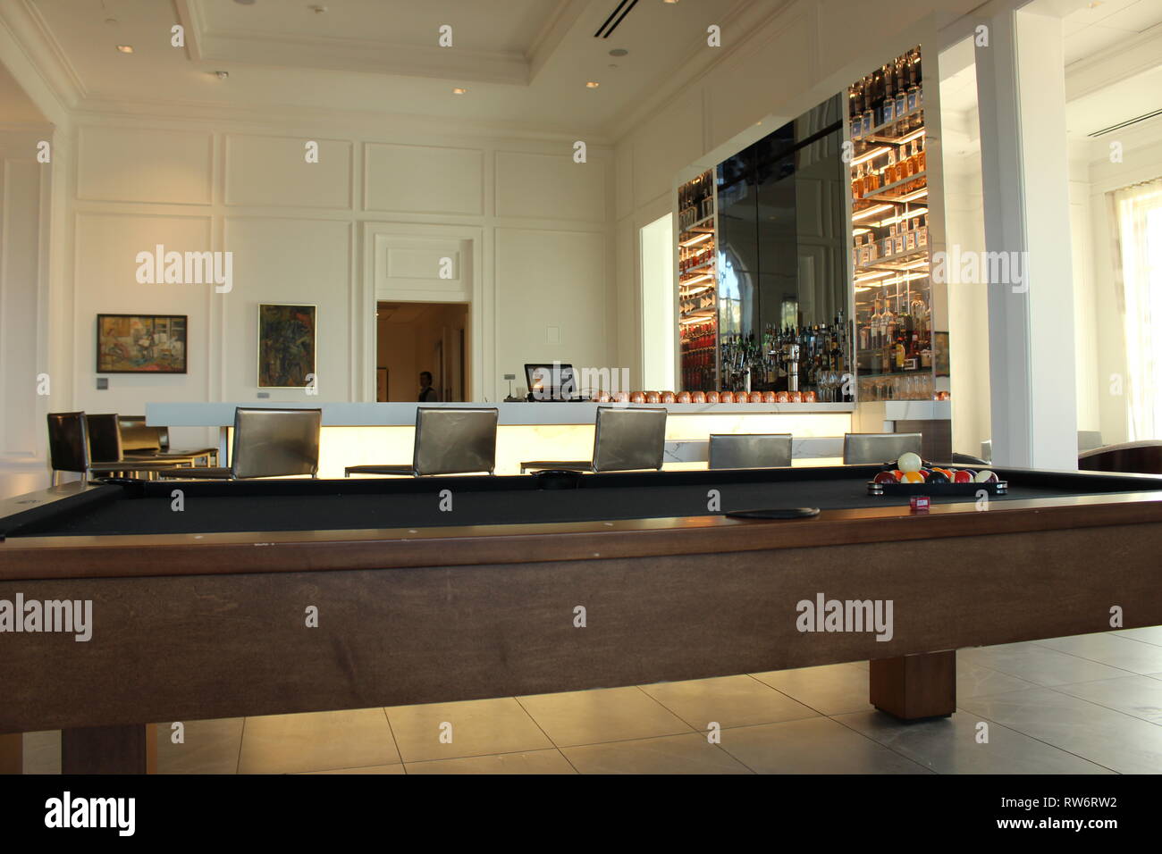 Pool table in hotel lobby bar Stock Photo - Alamy