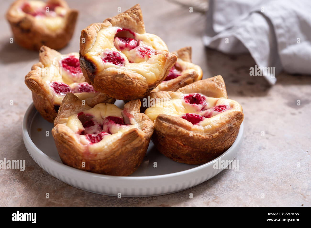 Raspberry Cream Cheese Puff Pastry Pies Stock Photo - Alamy