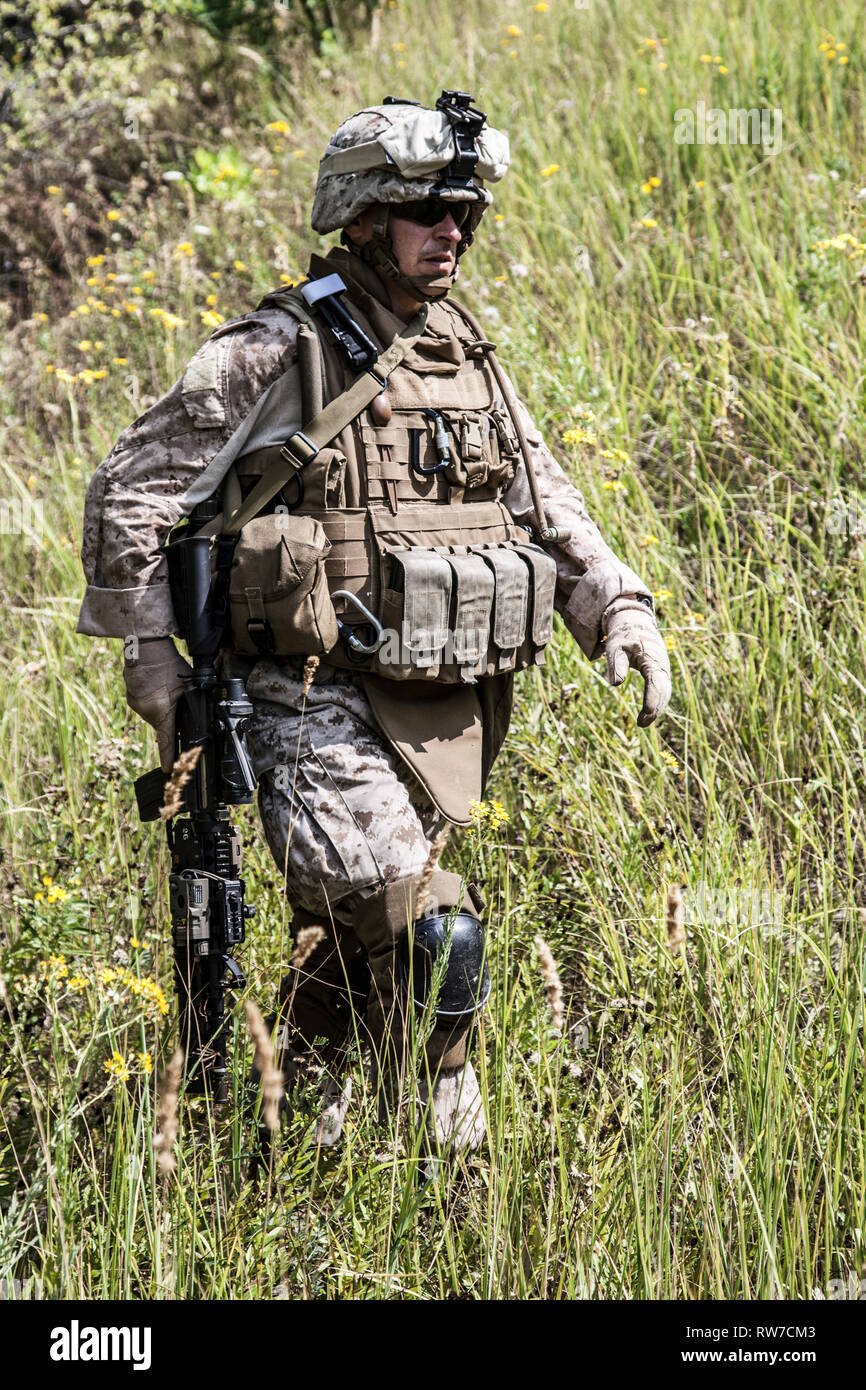 Close-up photo of U.S. Marine with his rifle Stock Photo - Alamy