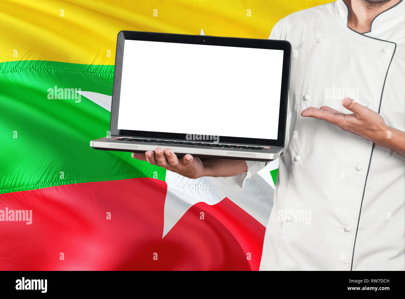 Myanmarese Chef holding laptop with blank screen on Myanmar flag ...