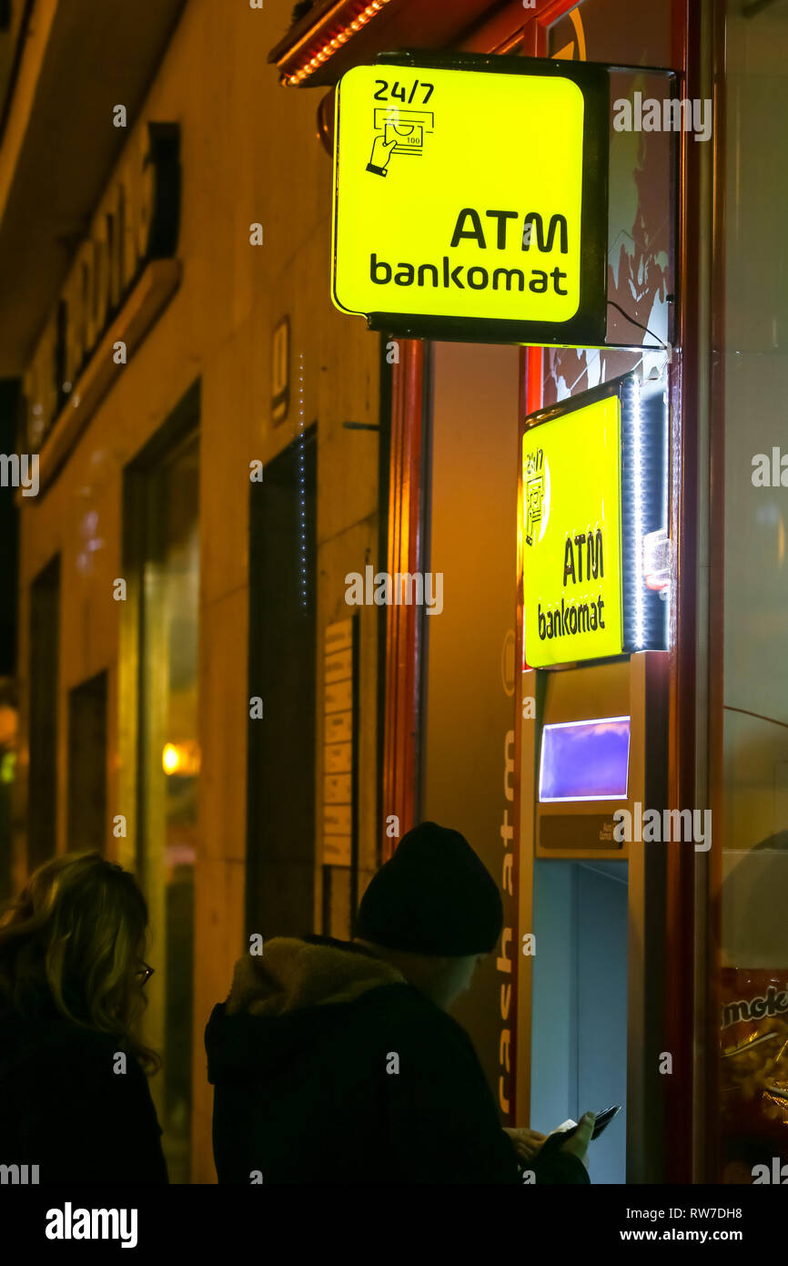 Zagreb, Croatia - 29th, December 2018 : People picking up money on the ...