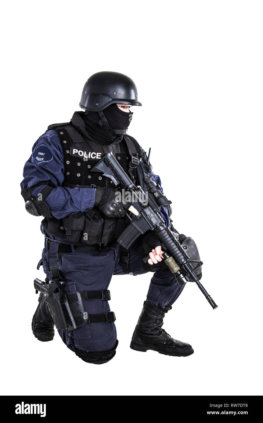 Special weapons and tactics (SWAT) team officer with his gun Stock ...